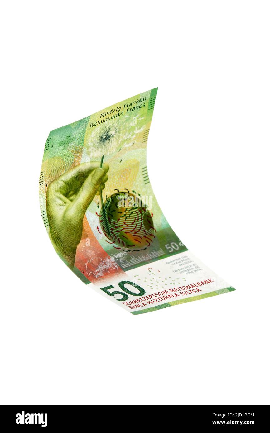 Flying Swiss money isolated with clipping path Stock Photo - Alamy