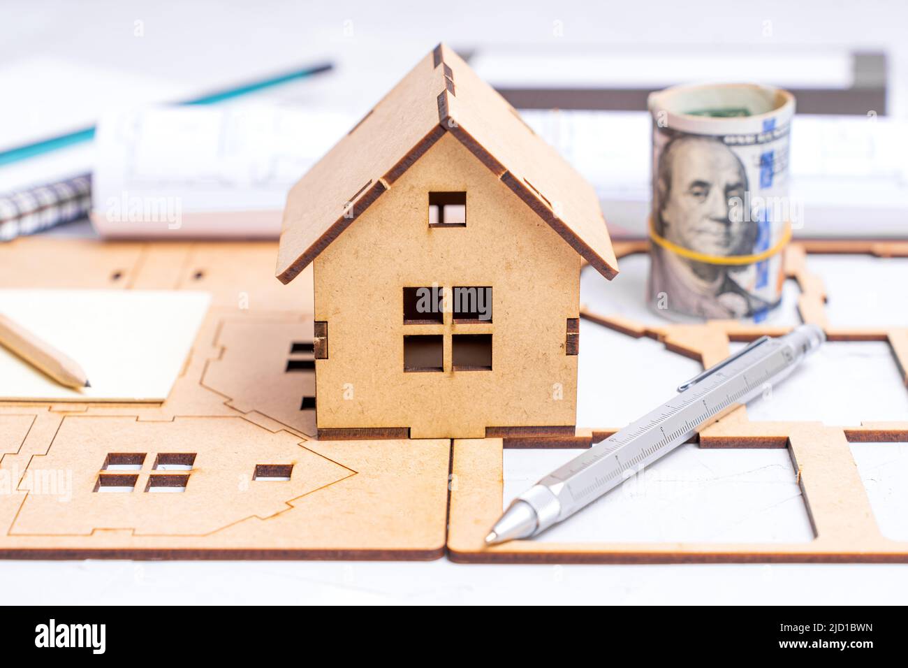 Save money while building a new house. Home engineering and financing concept Stock Photo - Alamy