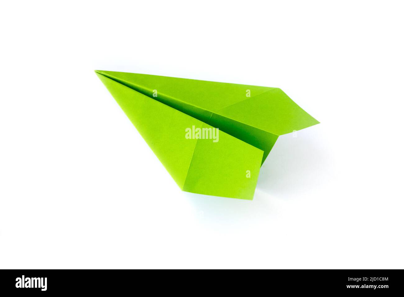 Green paper plane origami isolated on a blank white background Stock ...