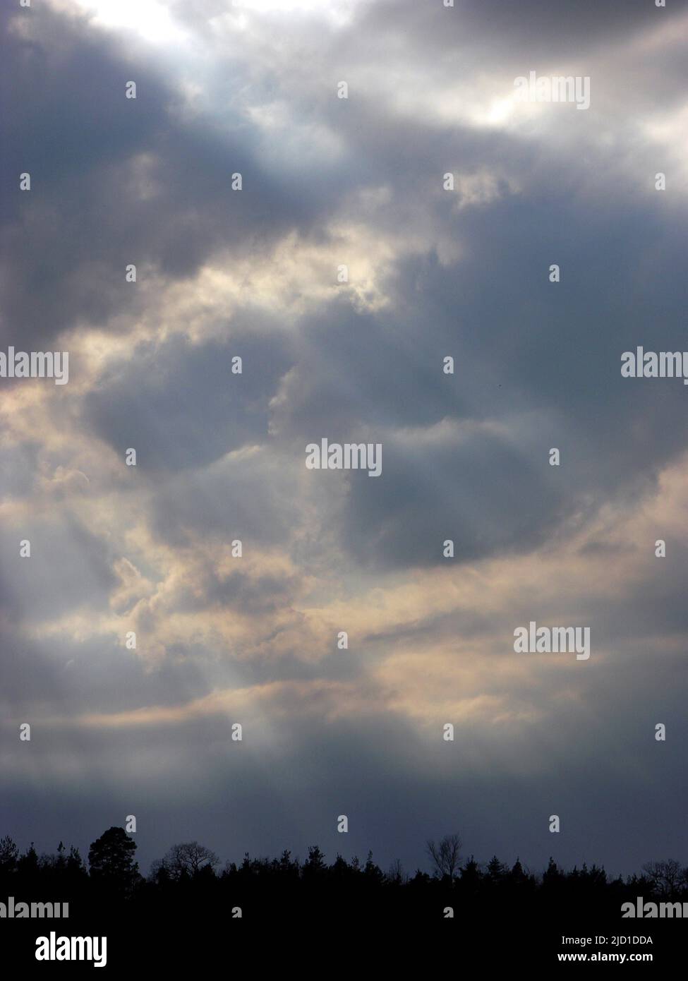 Dark storm clouds with rays, sunrays burst through, mood, dark storm ...