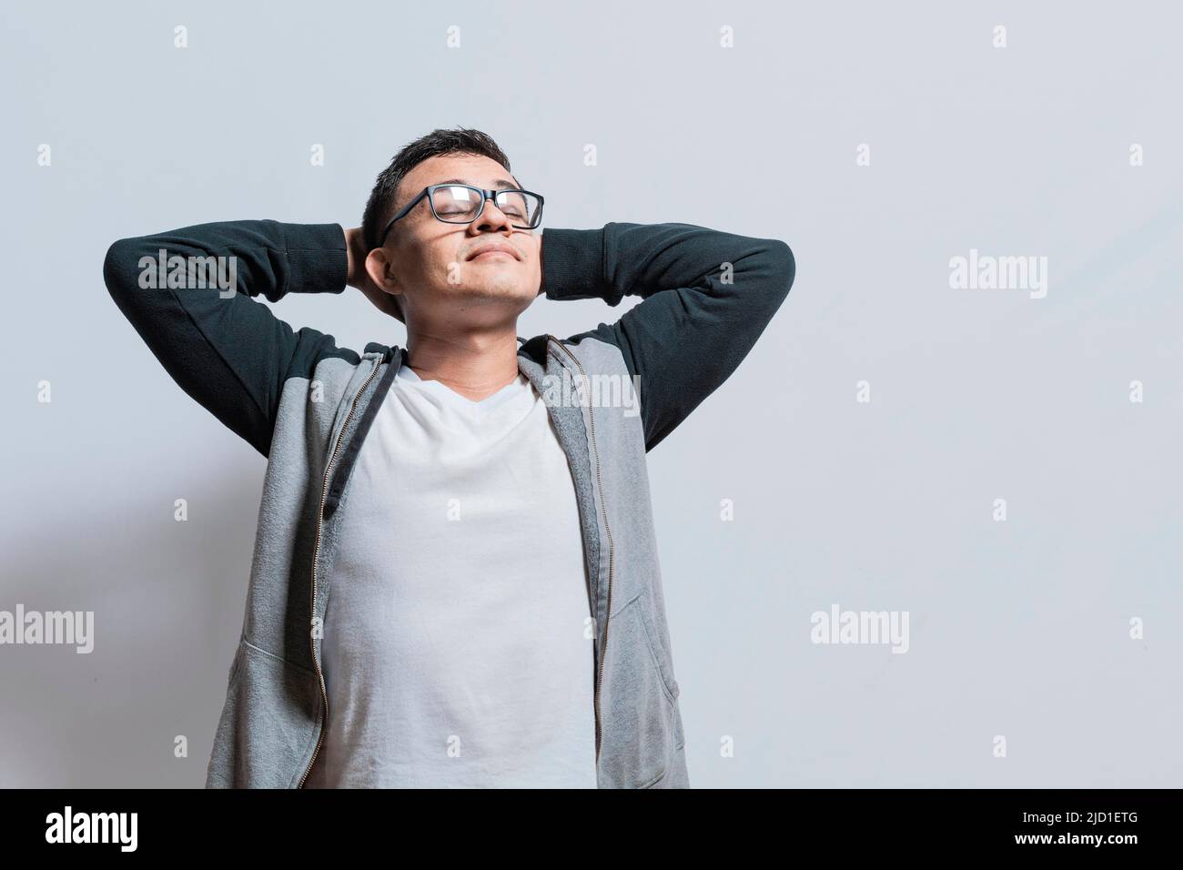 Satisfied person with hands behind his head, Concept of relaxed man ...
