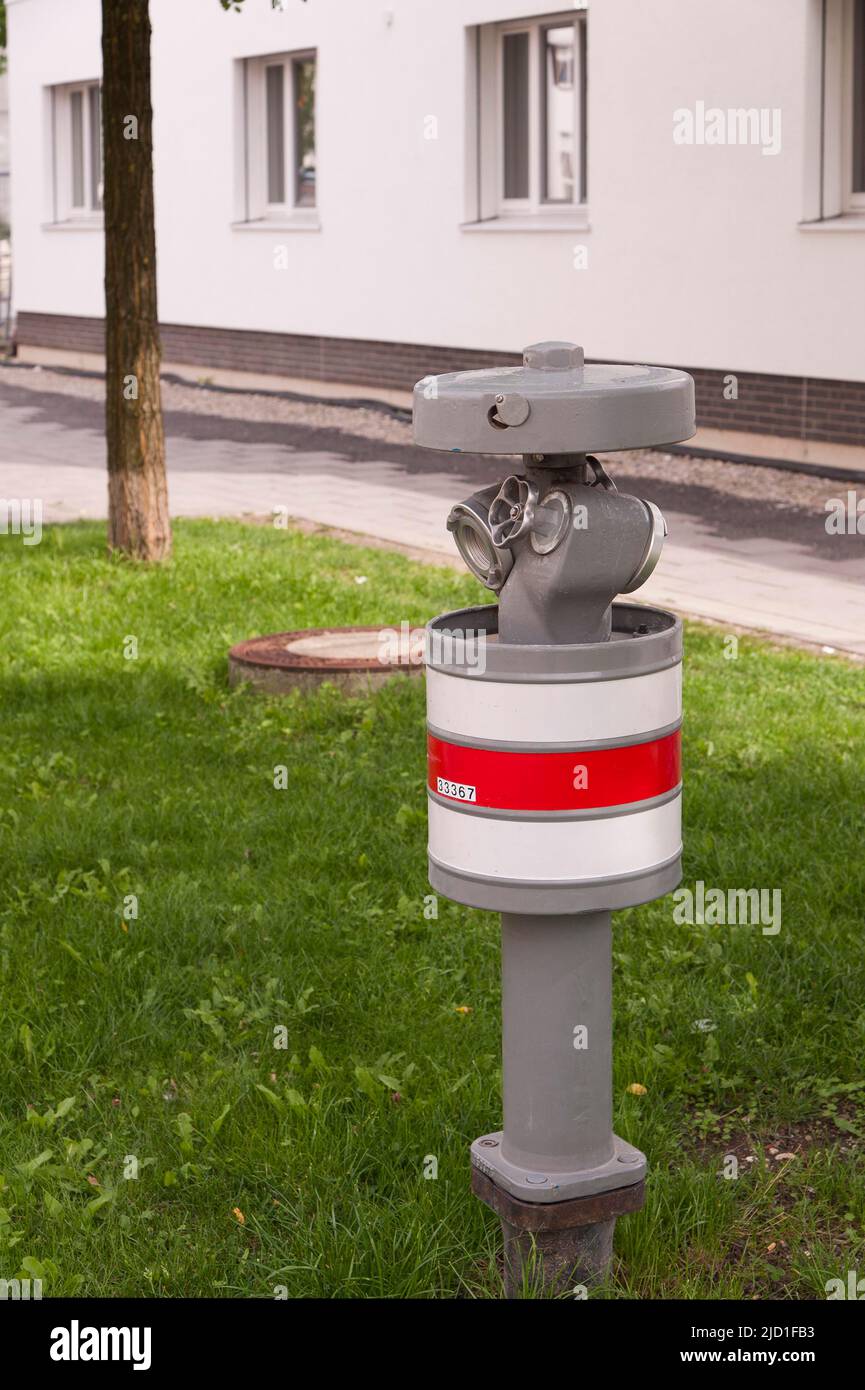 Hydrant, opened, at a residential building, Munich, Bavaria Stock Photo ...