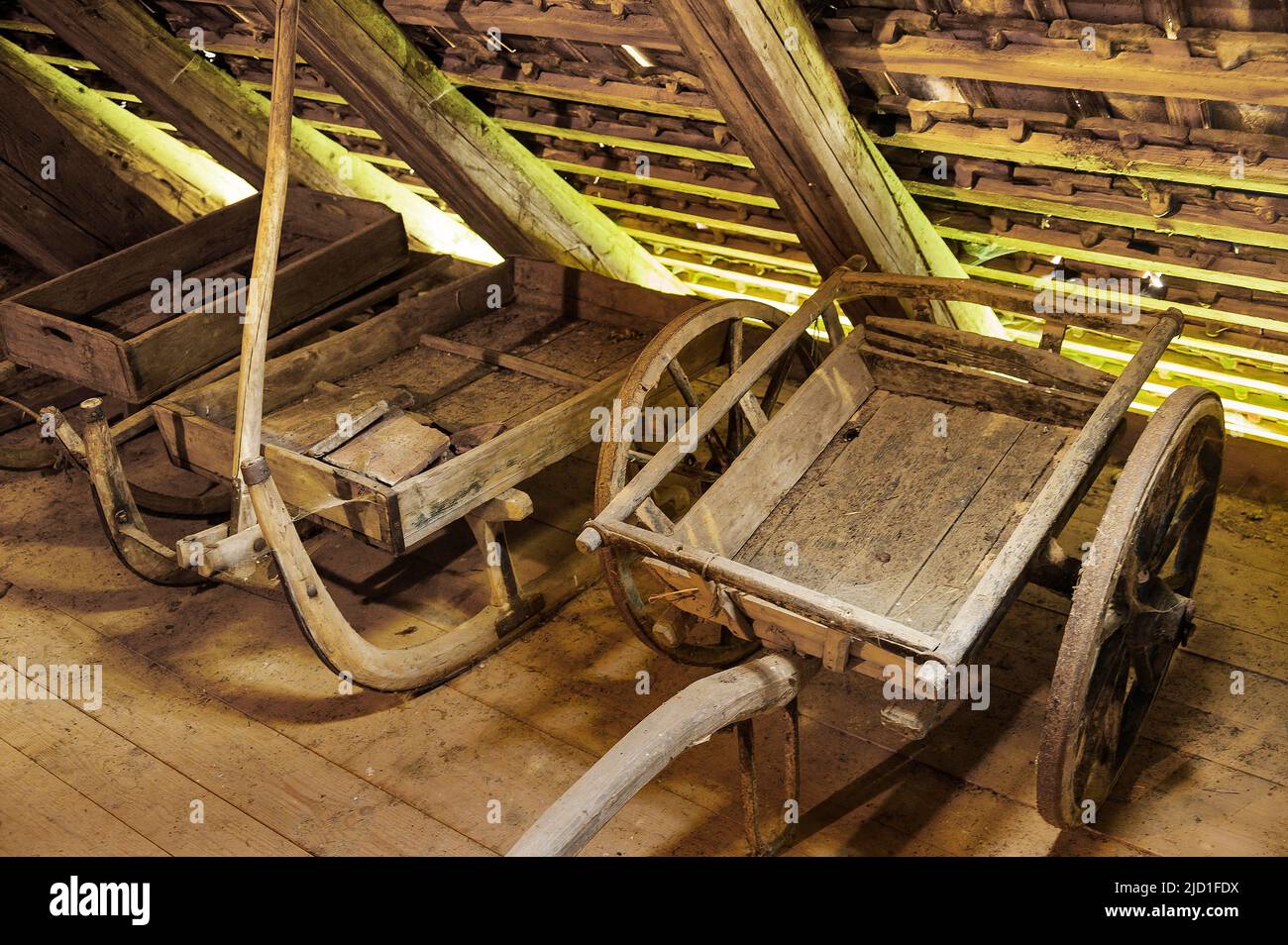 Old wooden cart and sledge, Schmidsfelden glassworks, Allgaeu, Bavaria ...
