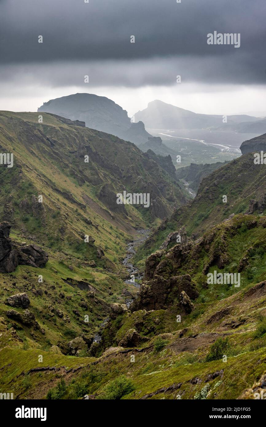 Mountain landscape with river valley, in the back mountain valley with ...