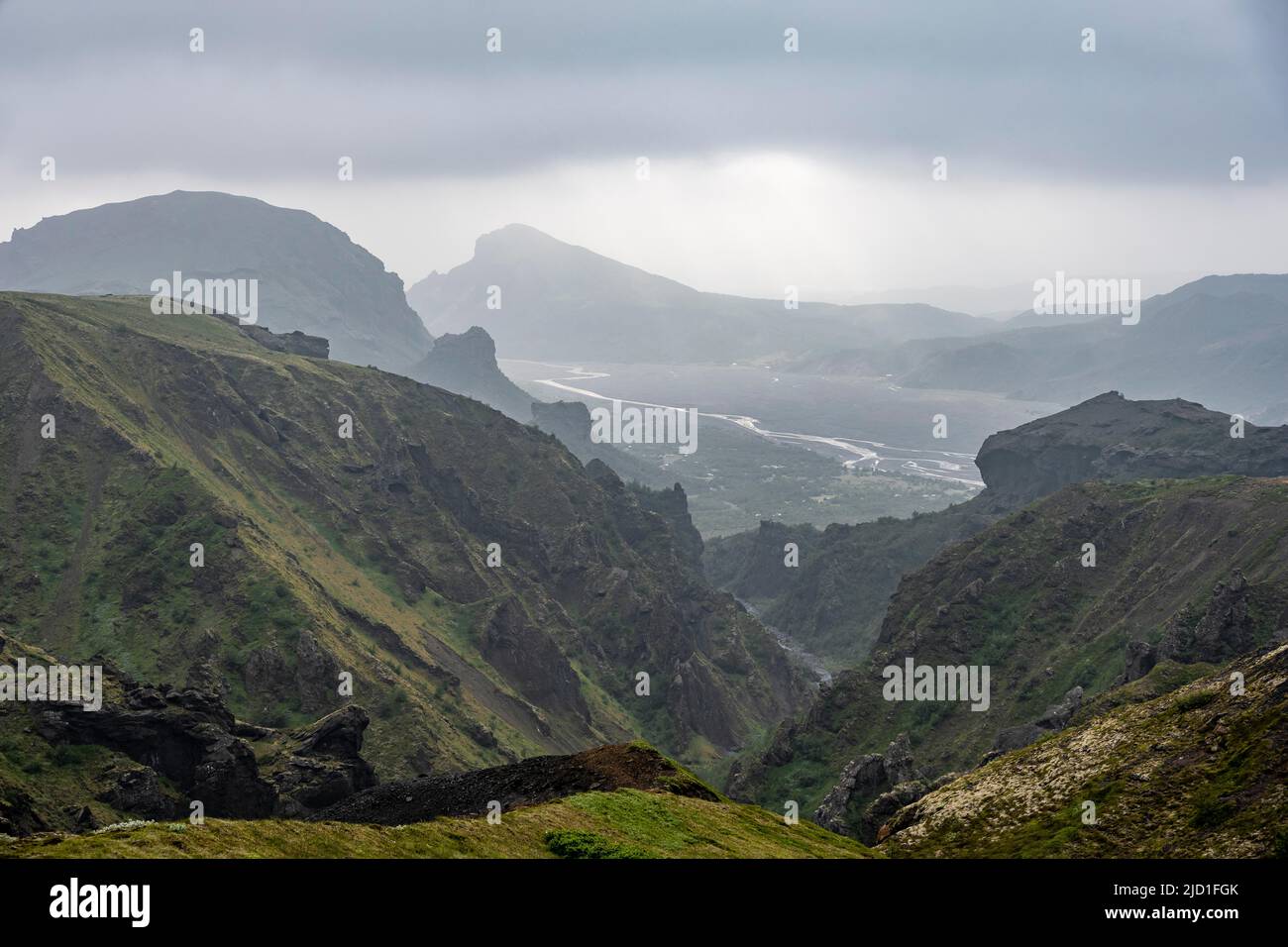 Mountain landscape with river valley, in the back mountain valley with ...