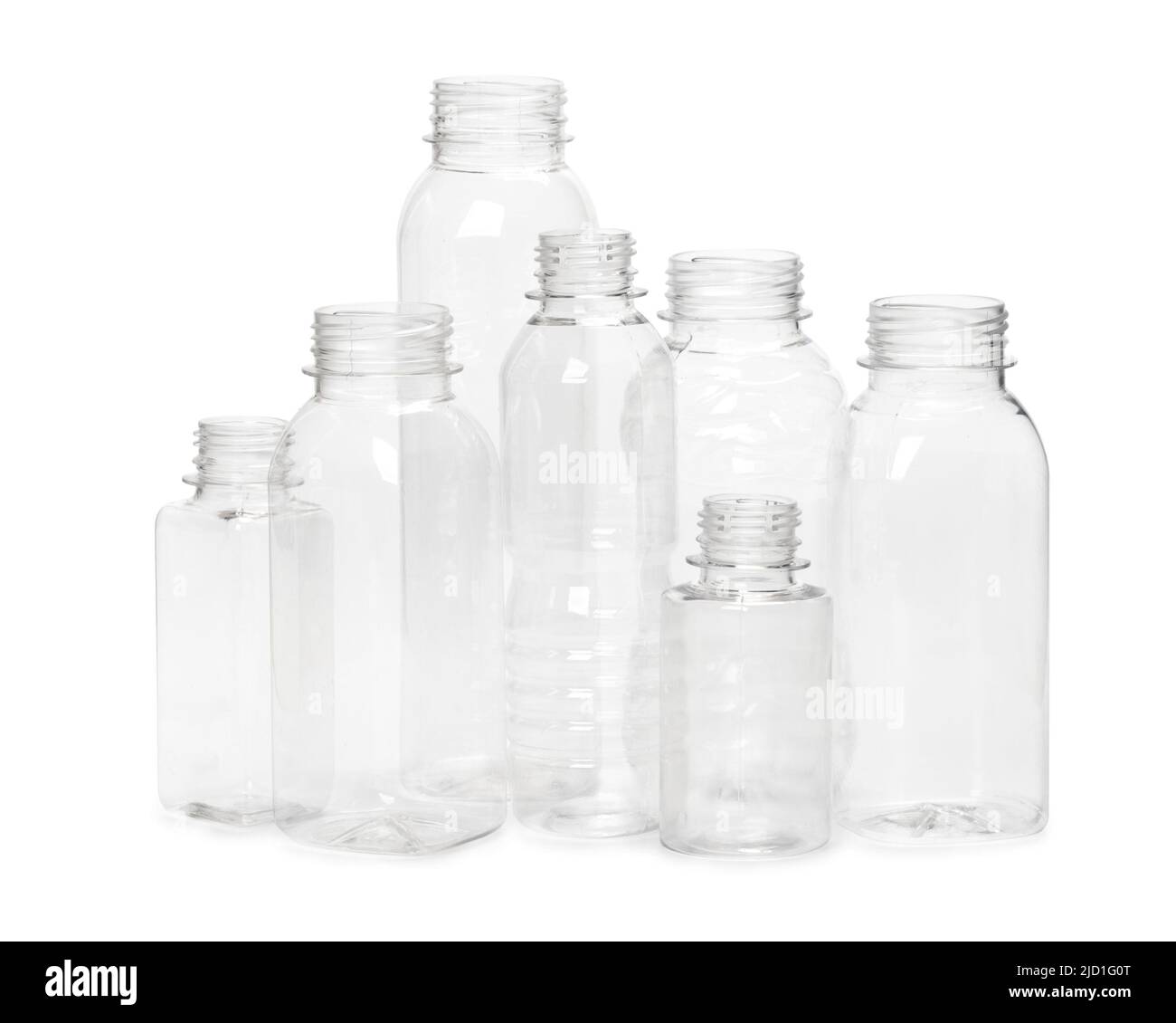 many different empty plastic bottles isolated on white background ...