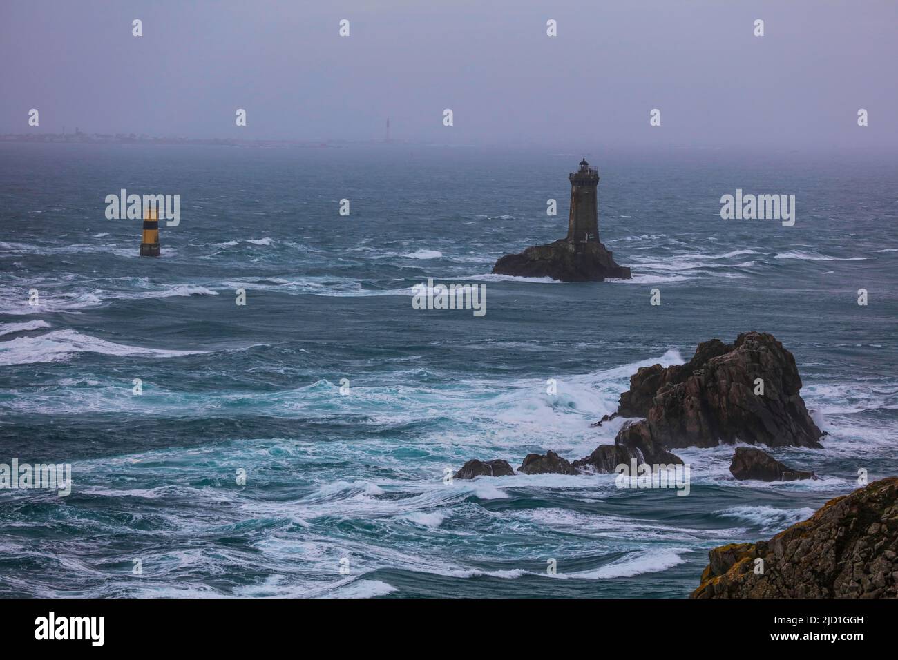 Pointe du Raz Beg ar Raz, rocky cape with the offshore lighthouses ...
