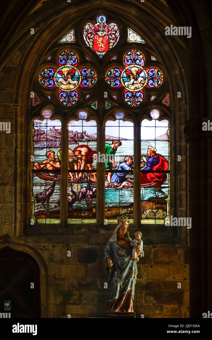 Choir gallery with leaded glass window and statue of the Virgin Mary ...
