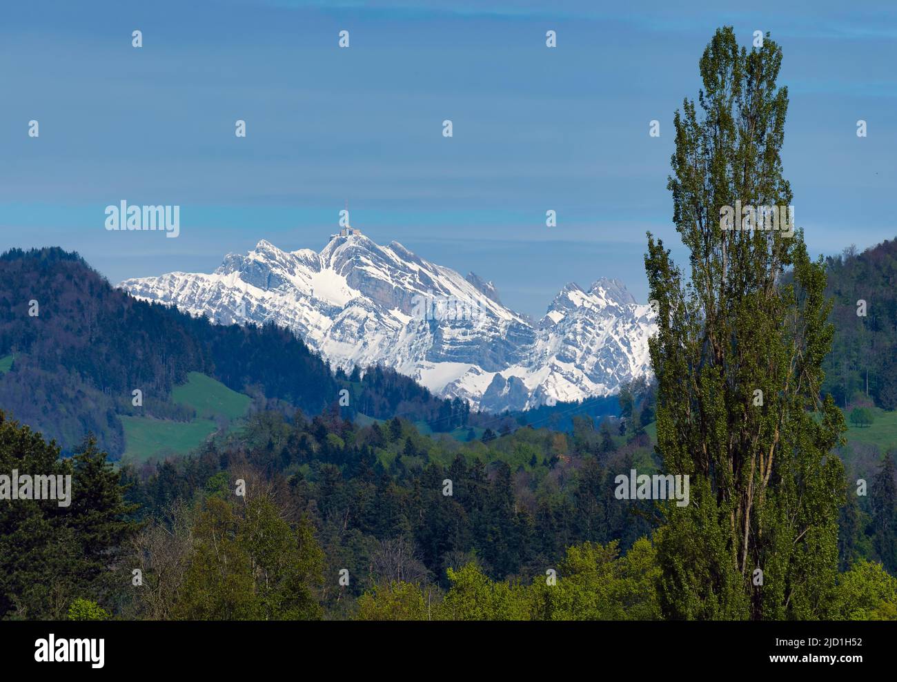 Snow-covered mountain range in the distance, Saentis, Appenzell ...