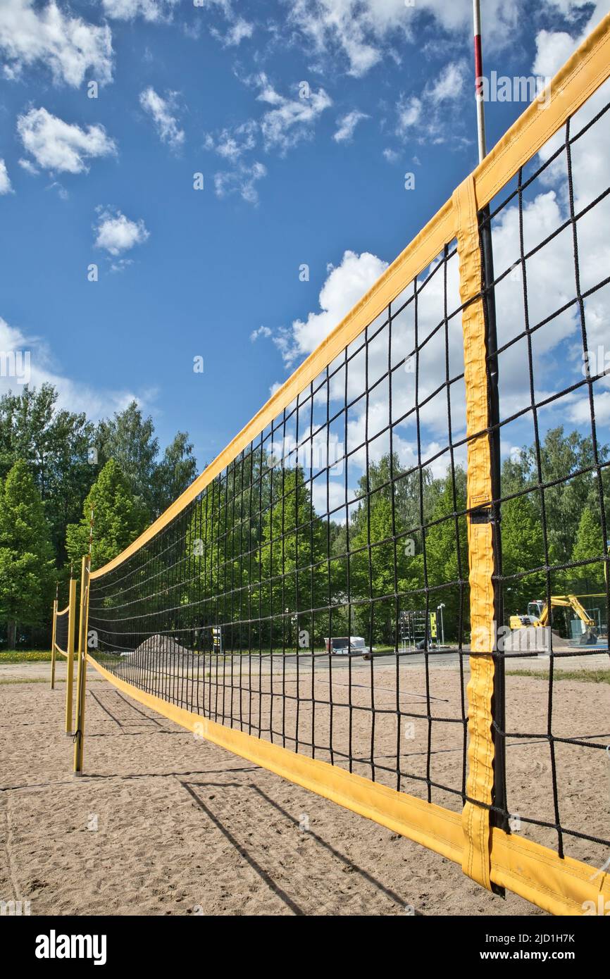 yellow beach volleyball net outdoors Stock Photo - Alamy