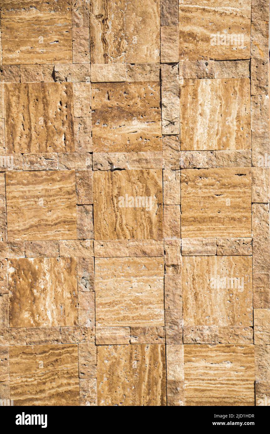 Decorative cubic stone wall as background texture Stock Photo - Alamy