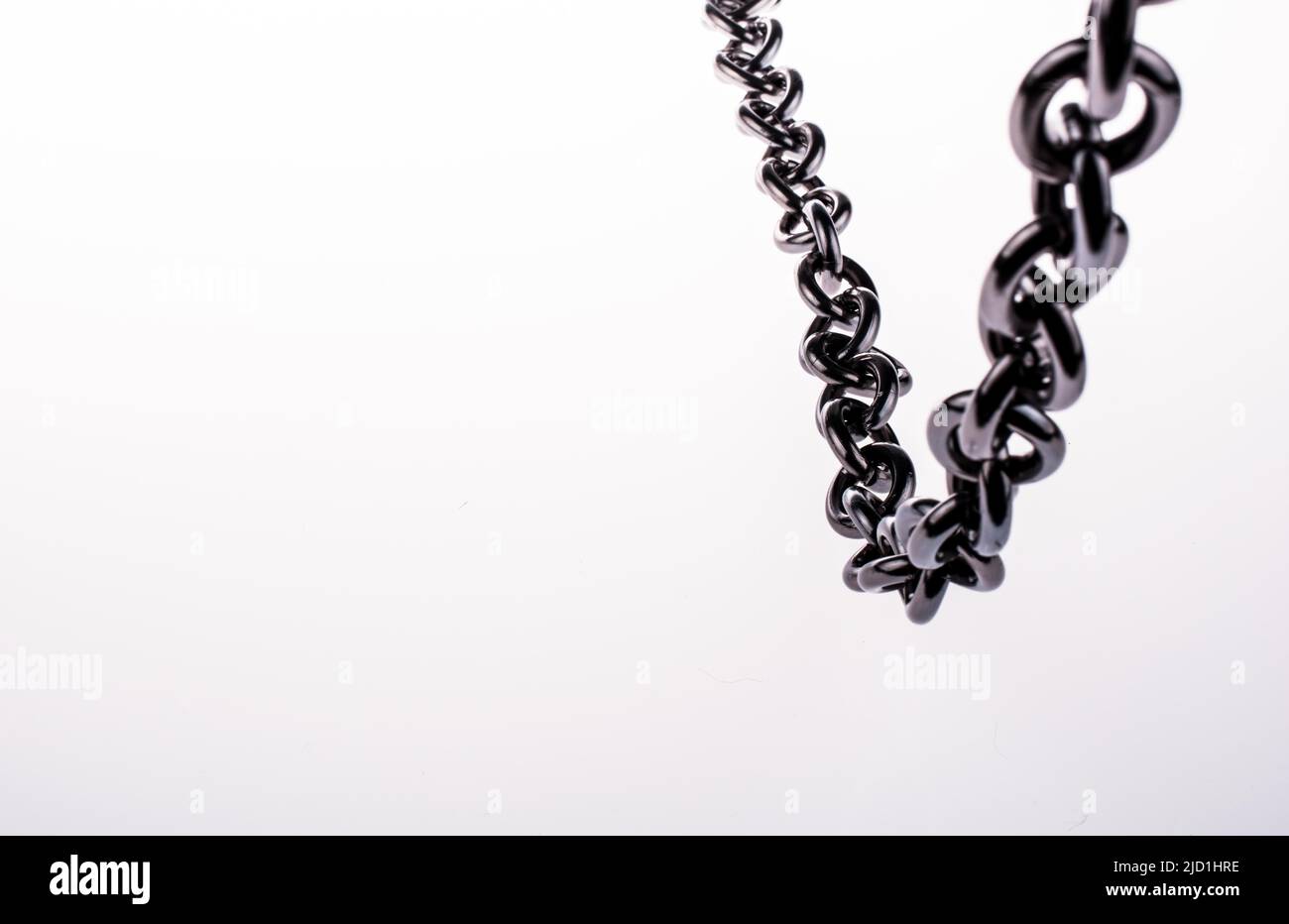 Metal chain on white background Stock Photo - Alamy