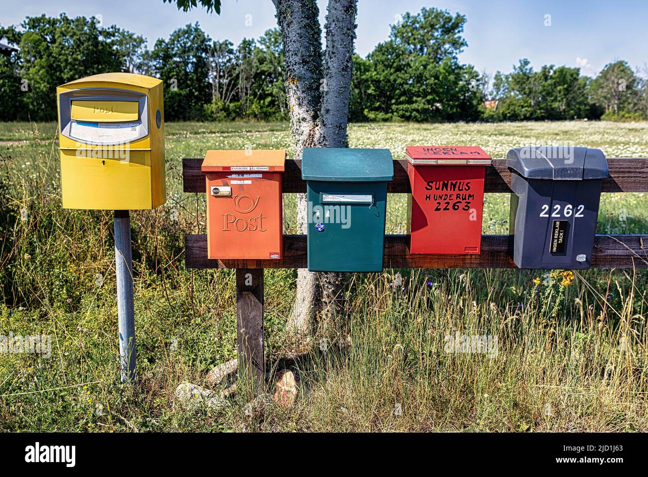 Five different coloured mailboxes, island Oeland, Sweden Stock Photo ...