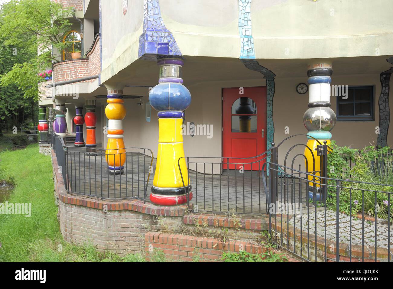 Corridor with colourful supporting poles and columns at the ...