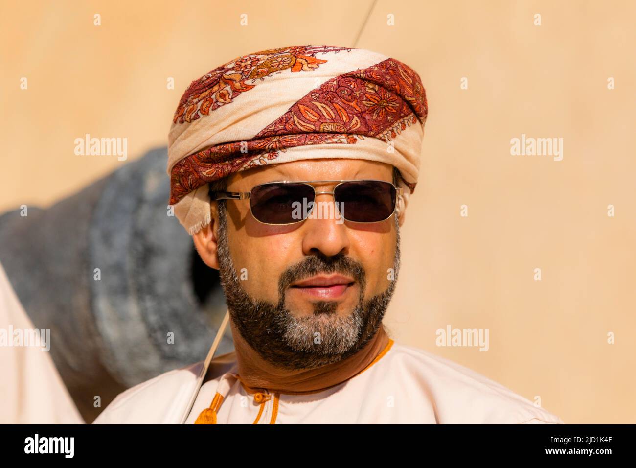 Man performing traditional songs during the Friday Goat Market in Nizwa ...