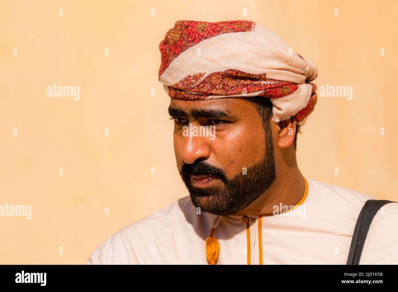 Man performing traditional songs during the Friday Goat Market in Nizwa ...