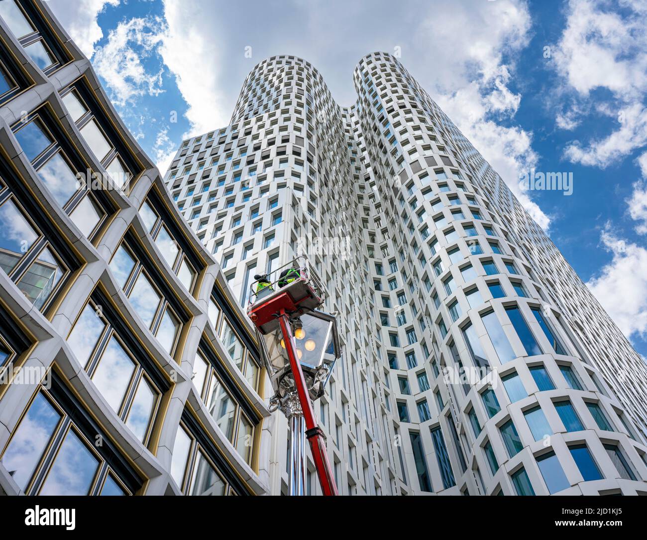 Maintenance work on the lantern in front of the Upper West high-rise ...