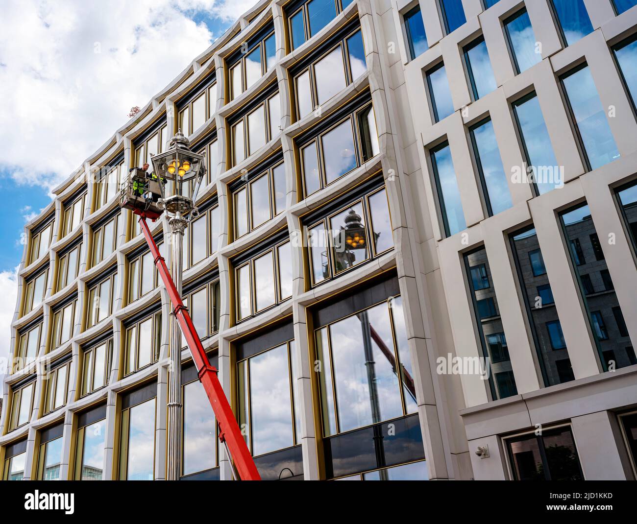 Maintenance work on the lantern in front of the Upper West high-rise ...