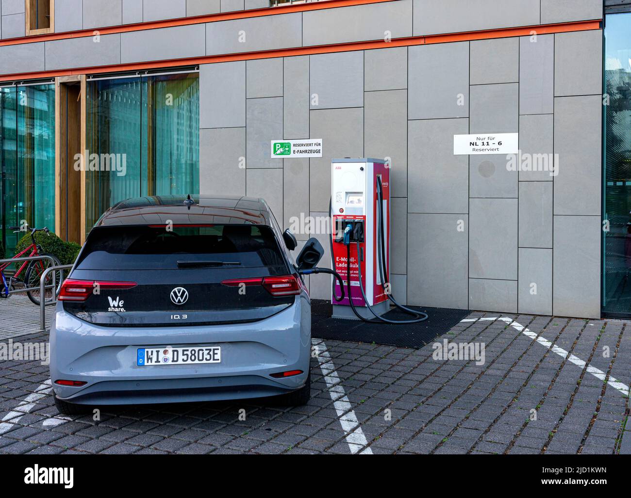 Electric car at the charging station, Berlin, Germany Stock Photo - Alamy