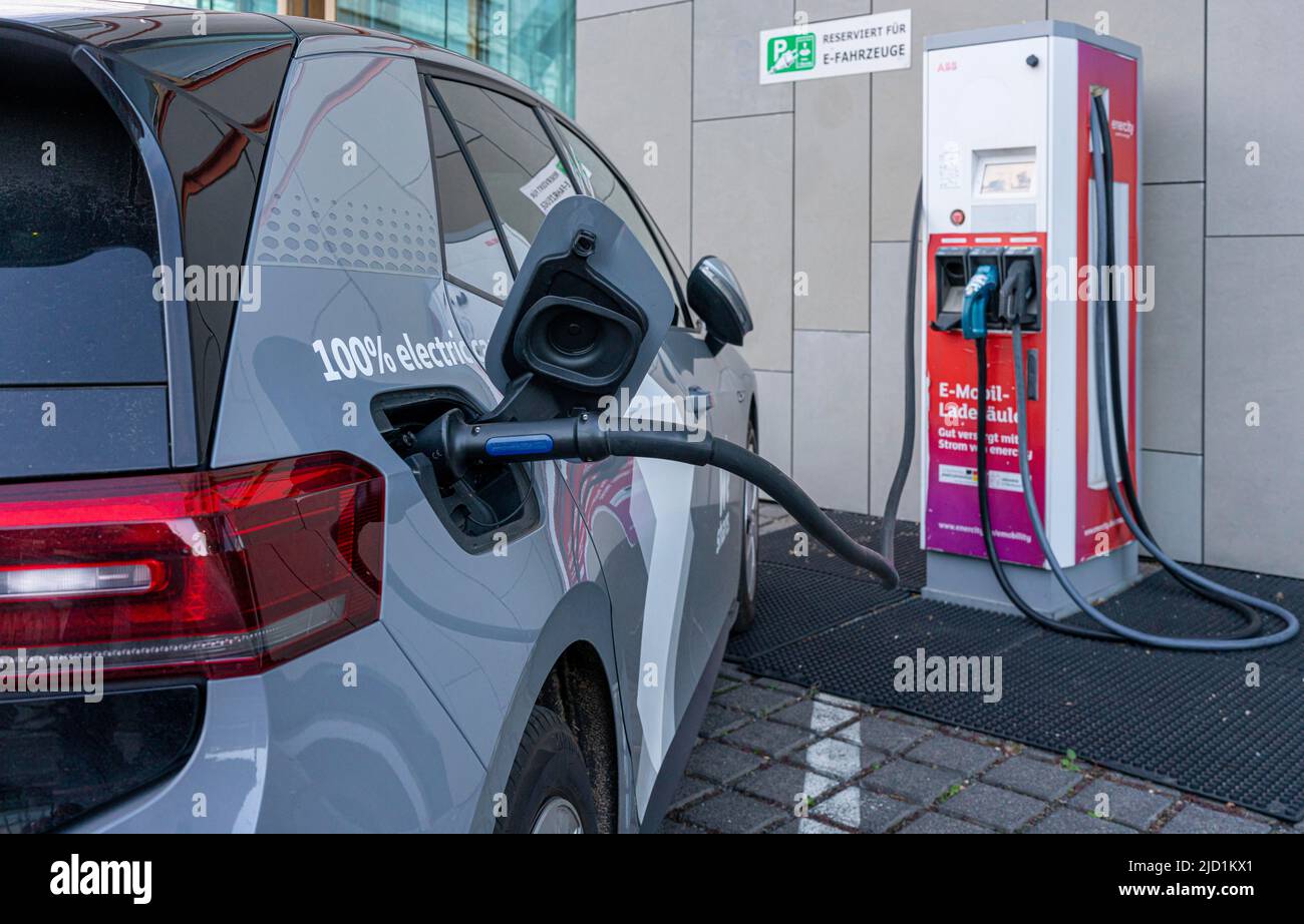 Electric car at the charging station, Berlin, Germany Stock Photo - Alamy