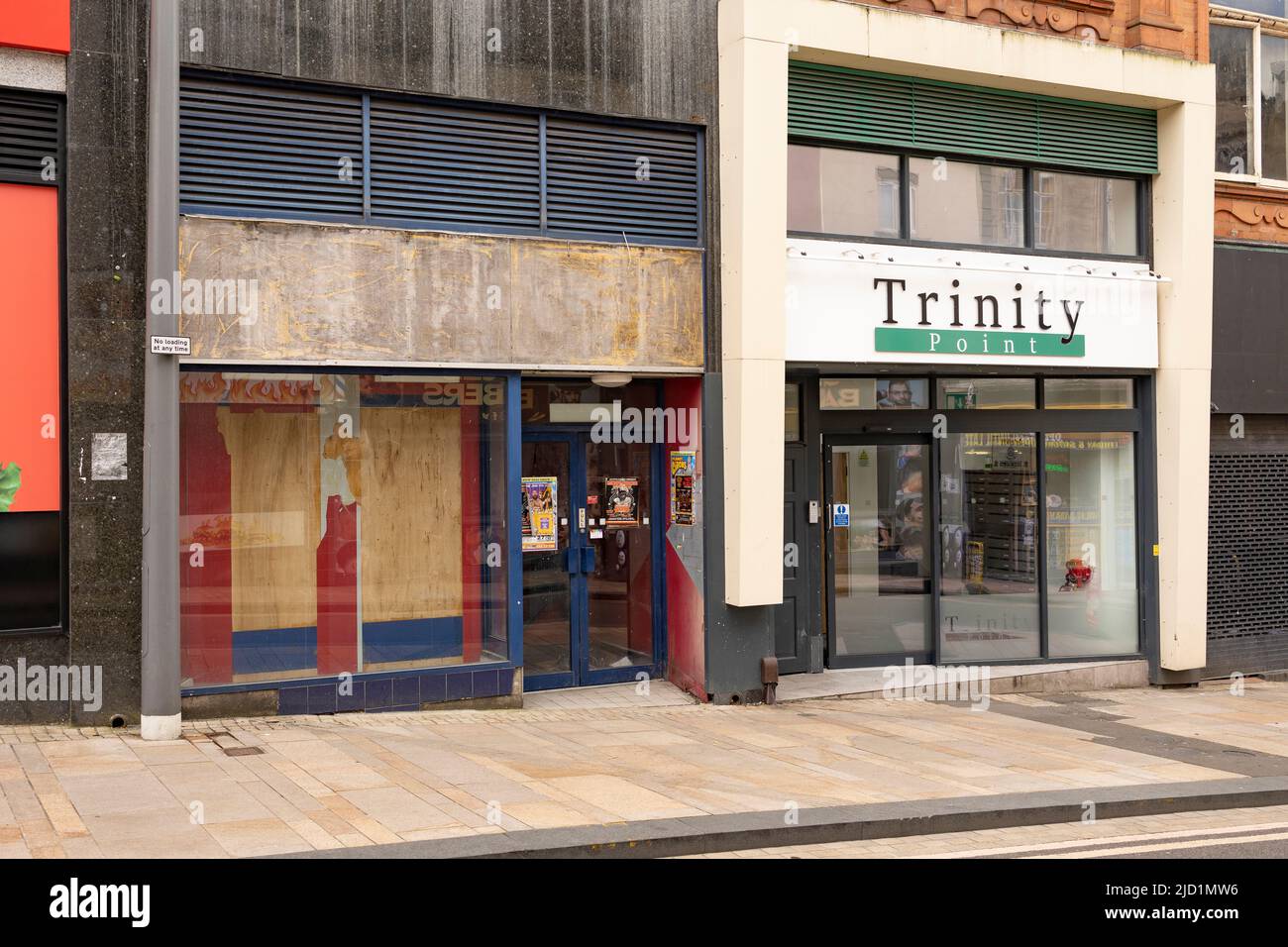 shops and retail premises either boarded up or empty due to economic ...
