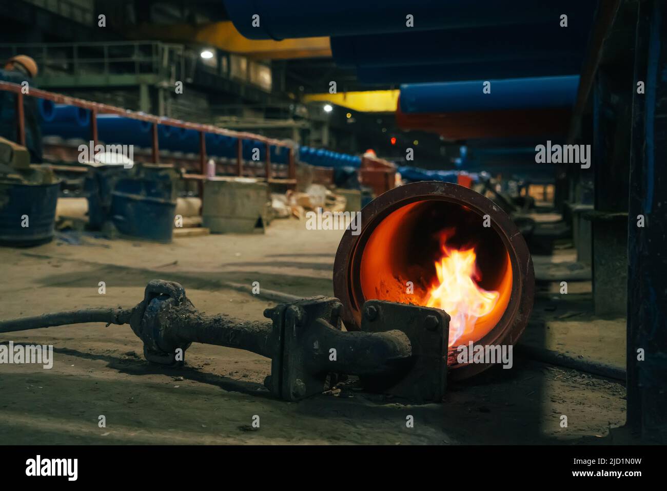 Cast iron pipes for pipeline are dried with fire and heat after ...