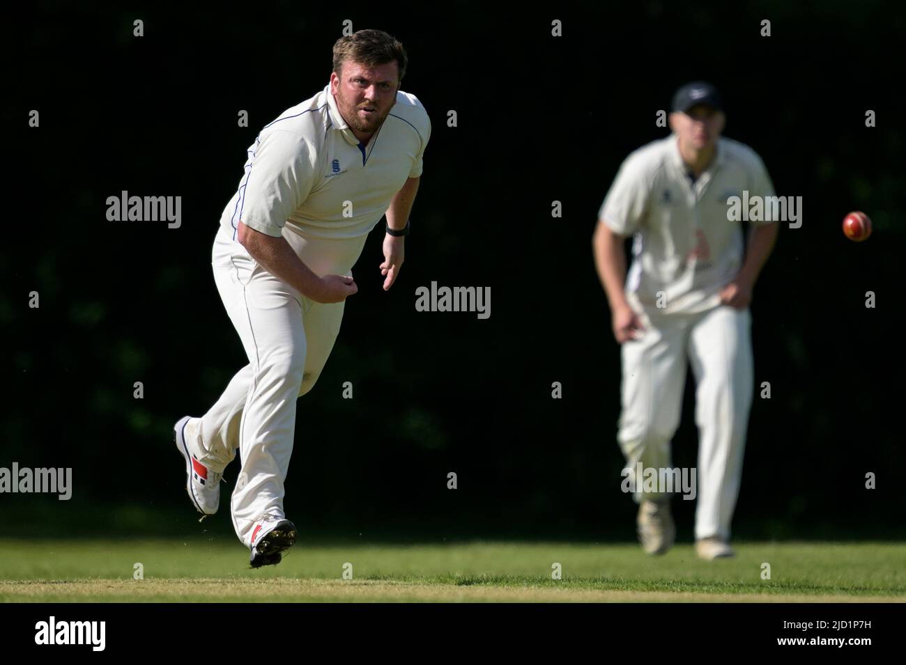 Bowler and fielder hi-res stock photography and images - Alamy