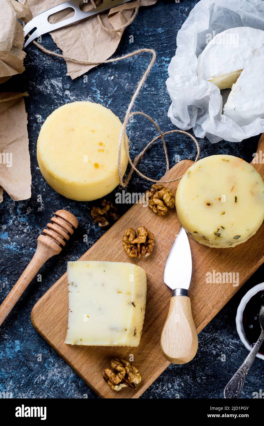 homemade cheesy with honey, fruits, cookies and nuts on table. Fresh ...