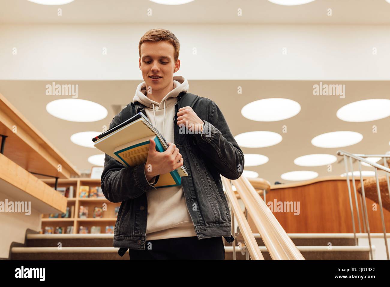 Male student going school hi-res stock photography and images - Alamy