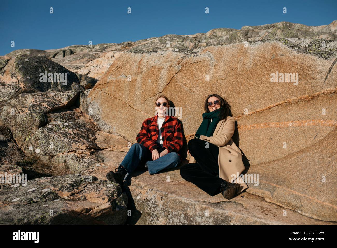 Female friends relaxing together Stock Photo - Alamy