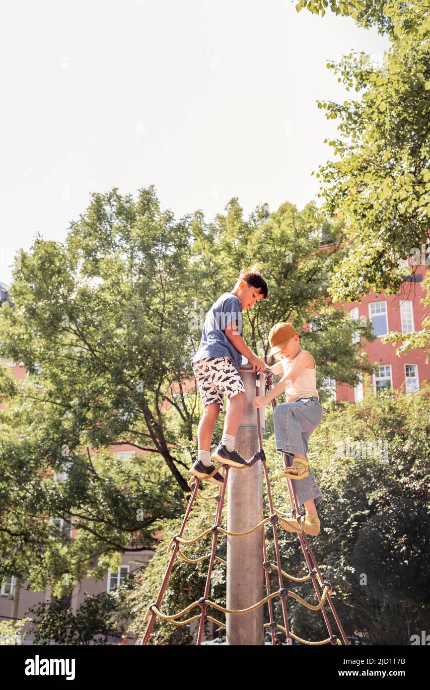 Two people climbing together hi-res stock photography and images - Alamy