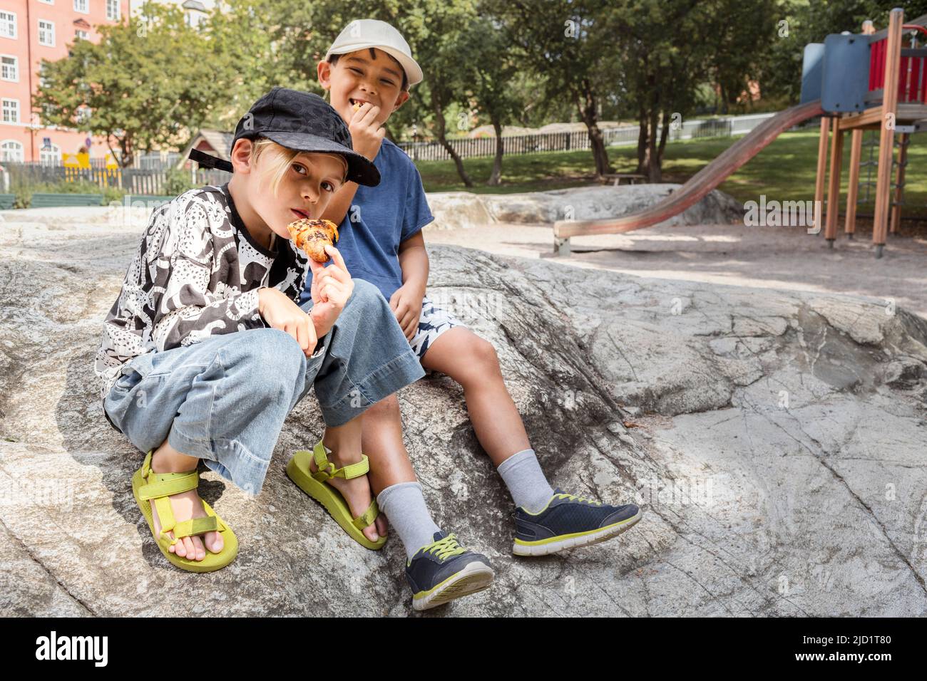 Group friends eating snacks sitting hi-res stock photography and images ...
