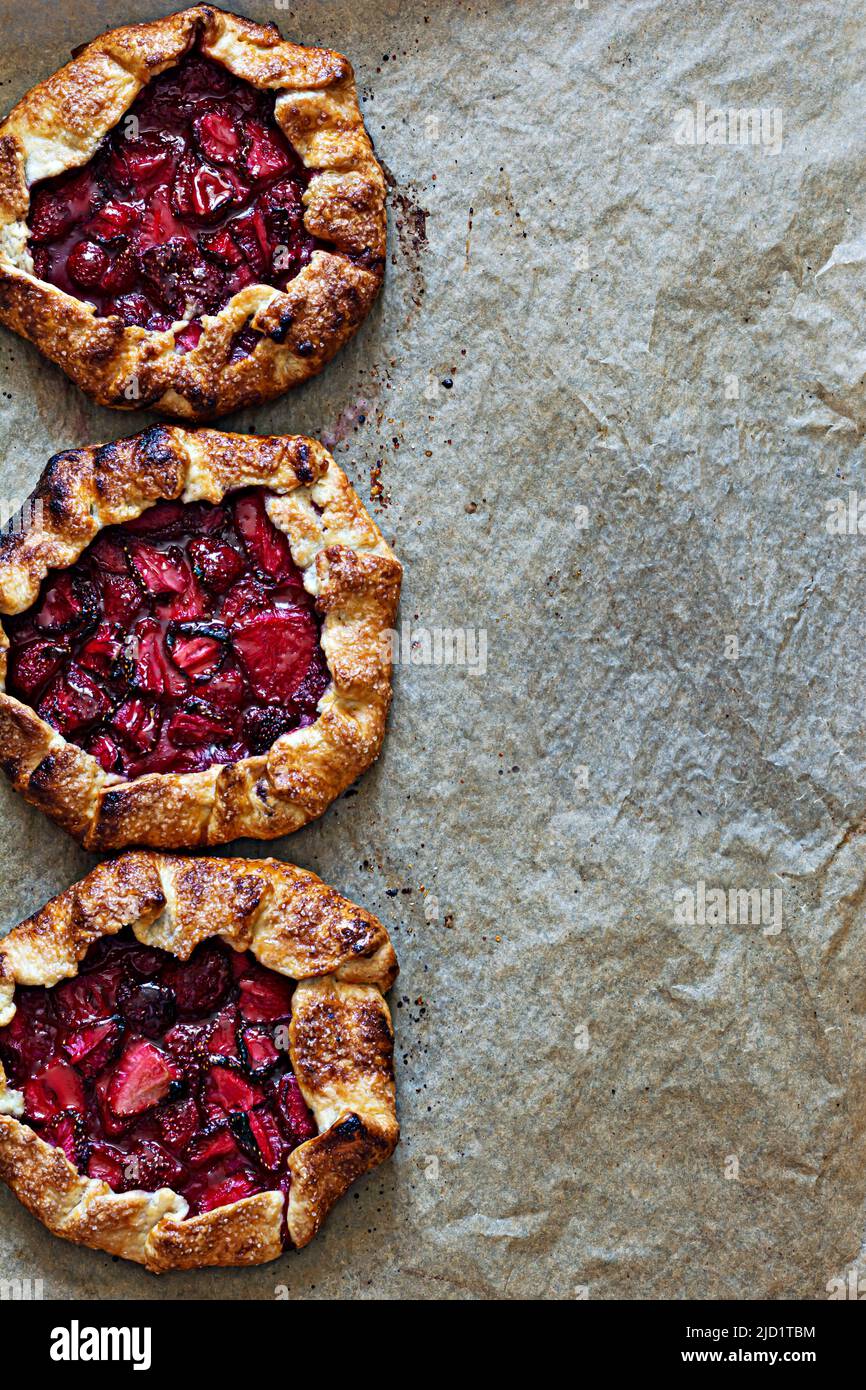 French dessert Galette with shortbread and strawberries. Open pie with ...