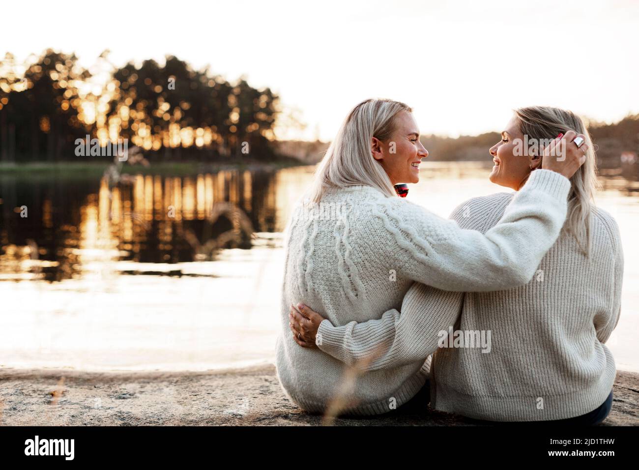 Summer evening couple sitting hi-res stock photography and images - Alamy