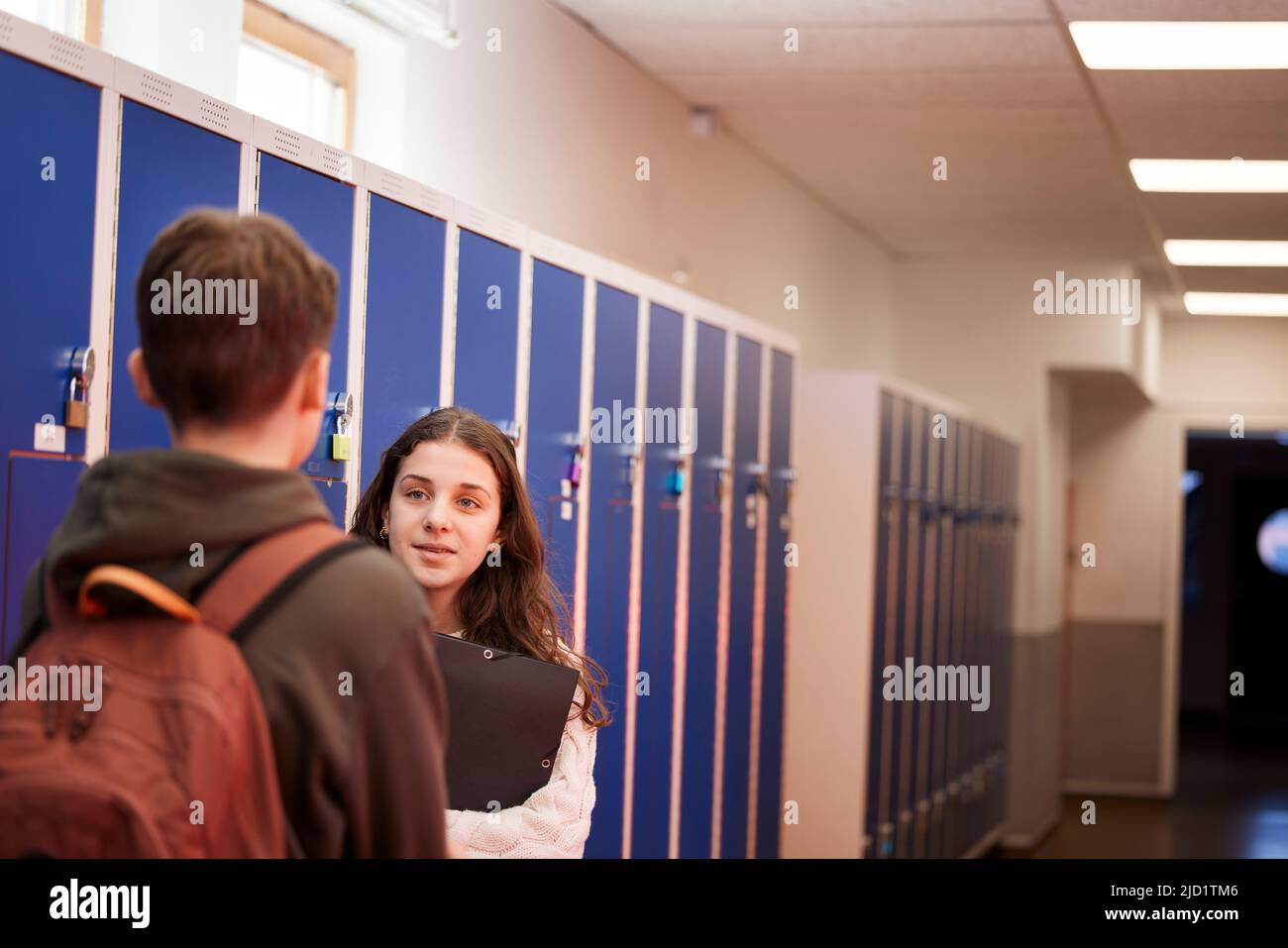 Two friends talking school hi-res stock photography and images - Alamy