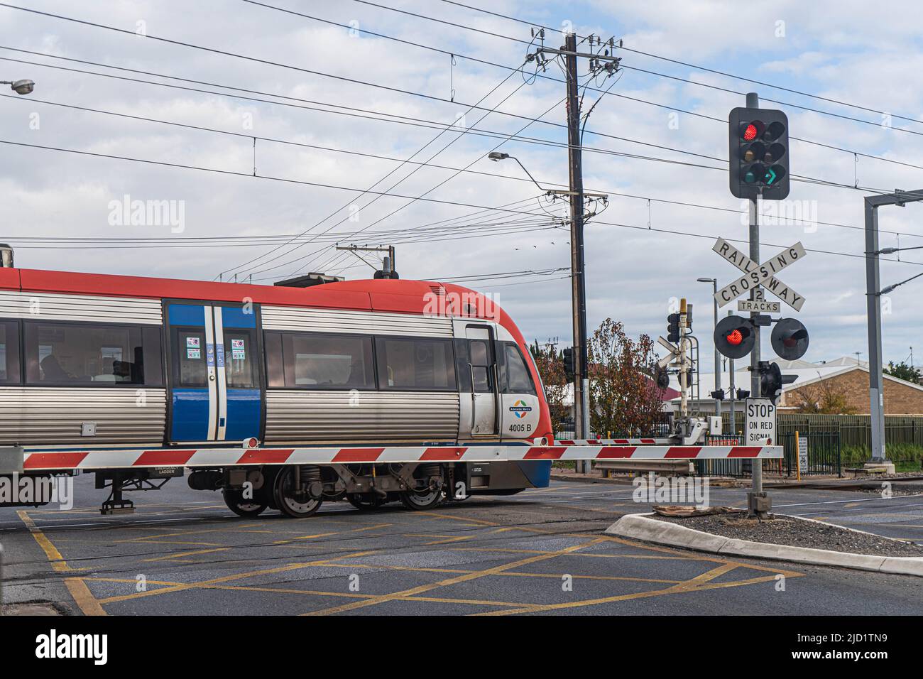 17 June 2022: Adelaide Metro train crosses the level crossing, Adelaide ...