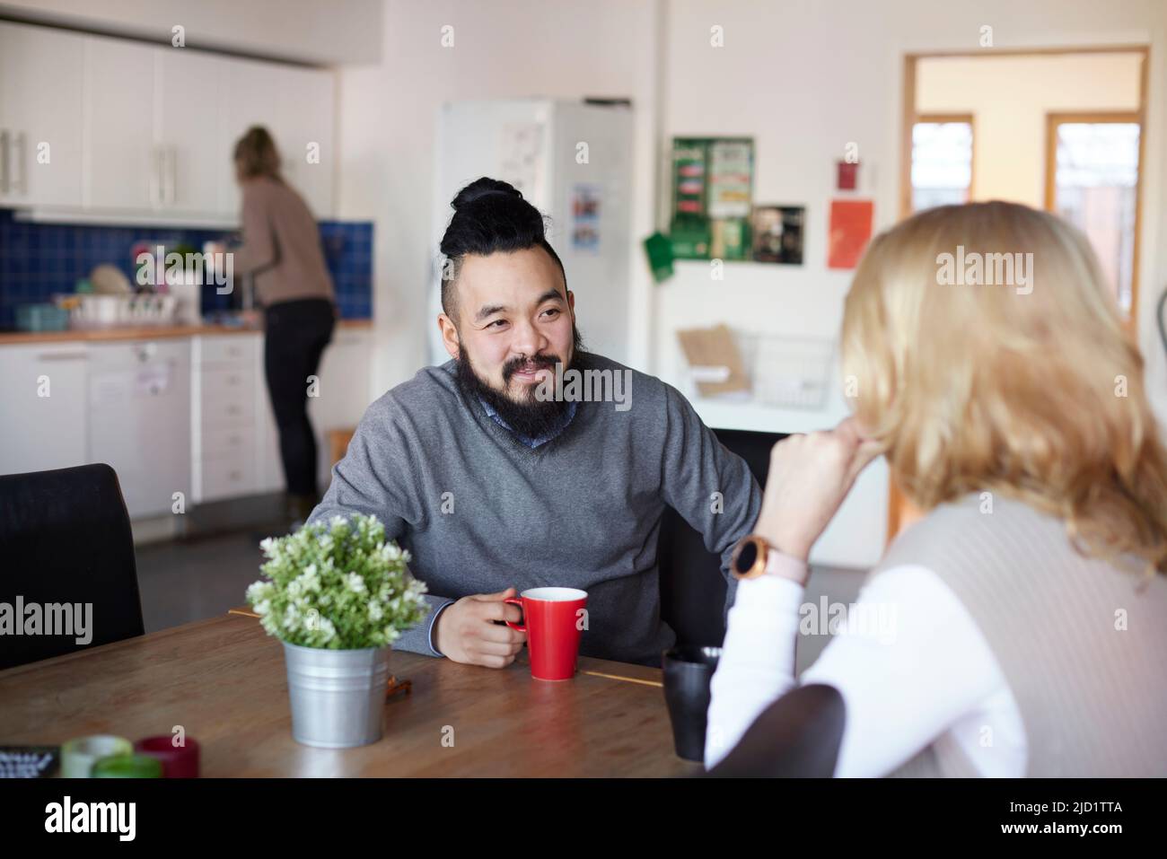 Teacher talking with co workers hi-res stock photography and images - Alamy