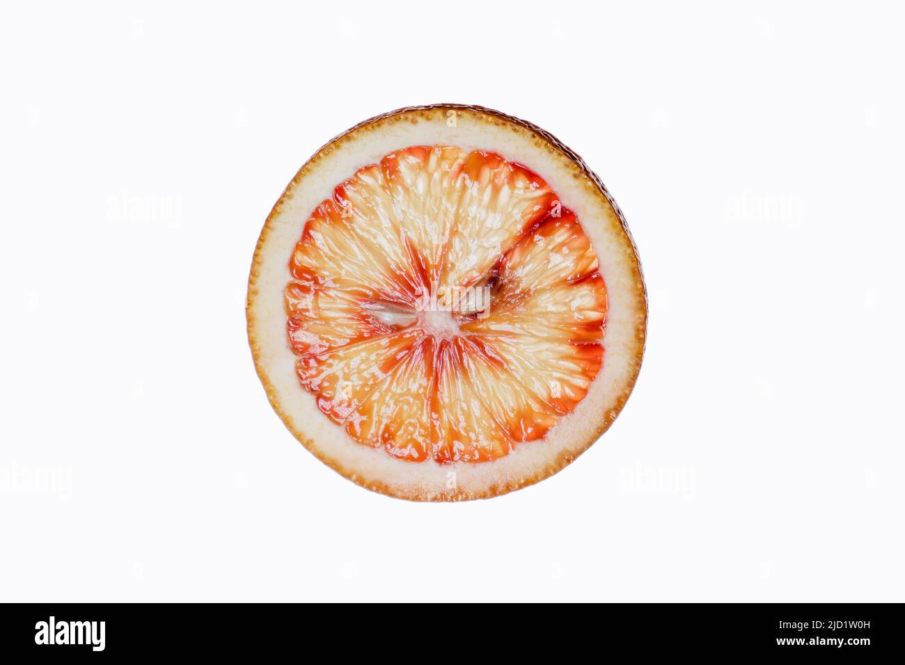Single orange slice with red streaks and pips isolated on white ...