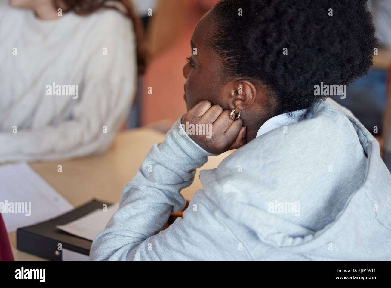 Sitting in class hi-res stock photography and images - Alamy