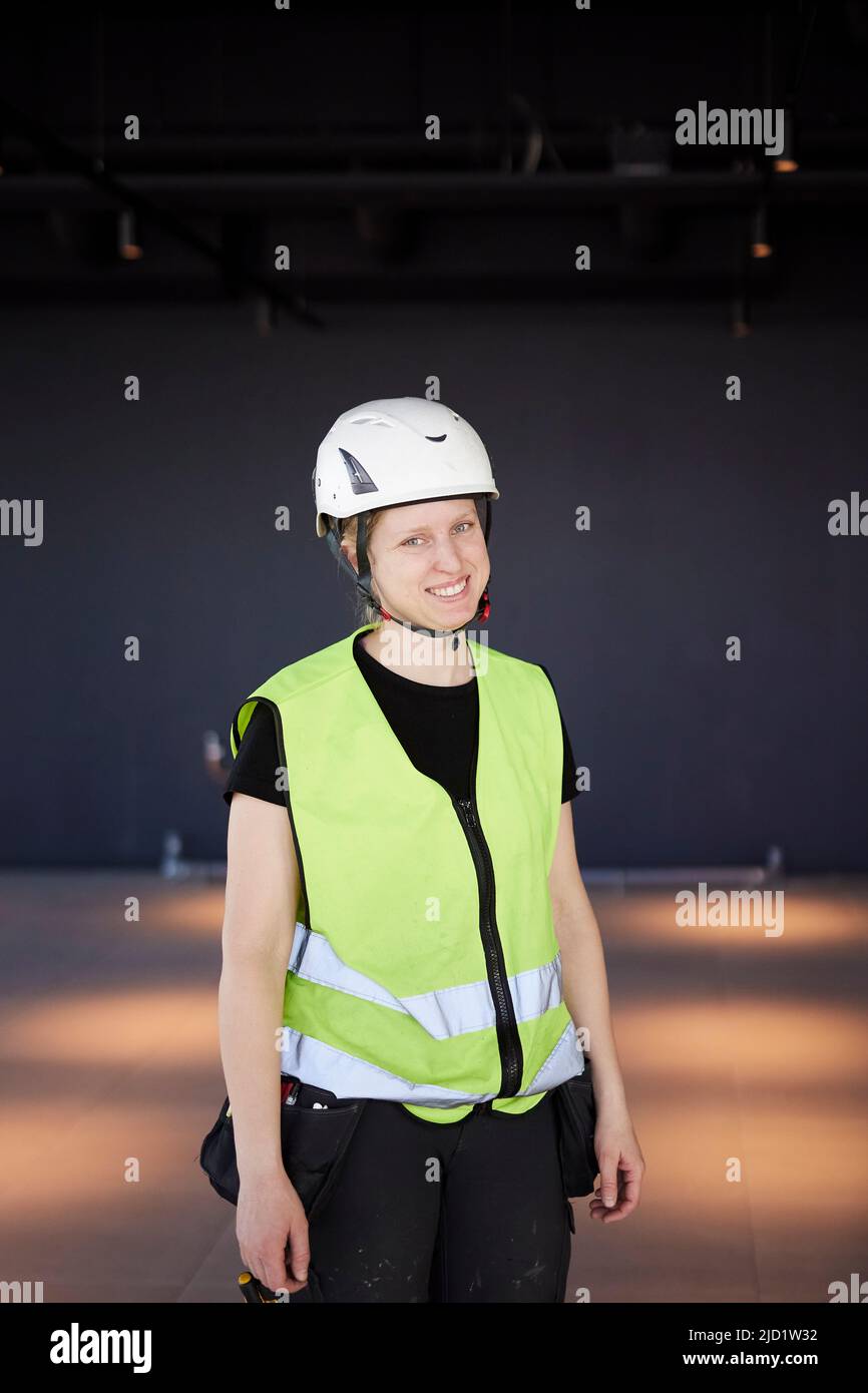 Vertical female construction site worker hi-res stock photography and ...