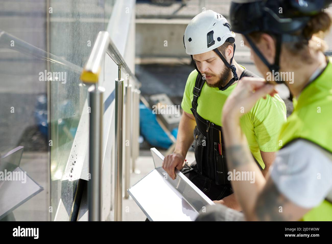 People working together build building hi-res stock photography and ...