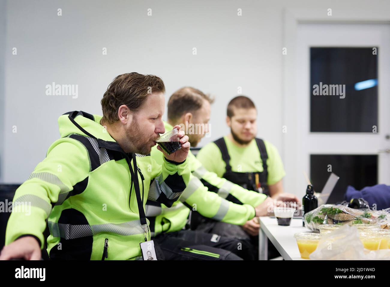 Workers having break Stock Photo - Alamy