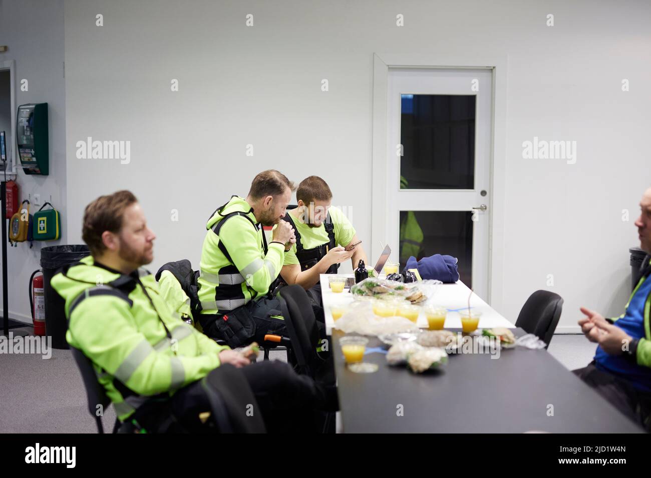 Workers having break Stock Photo - Alamy