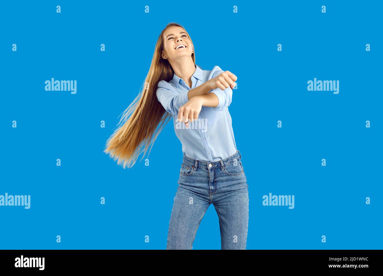 Funny happy woman in shirt and jeans dancing gangnam style isolated on ...