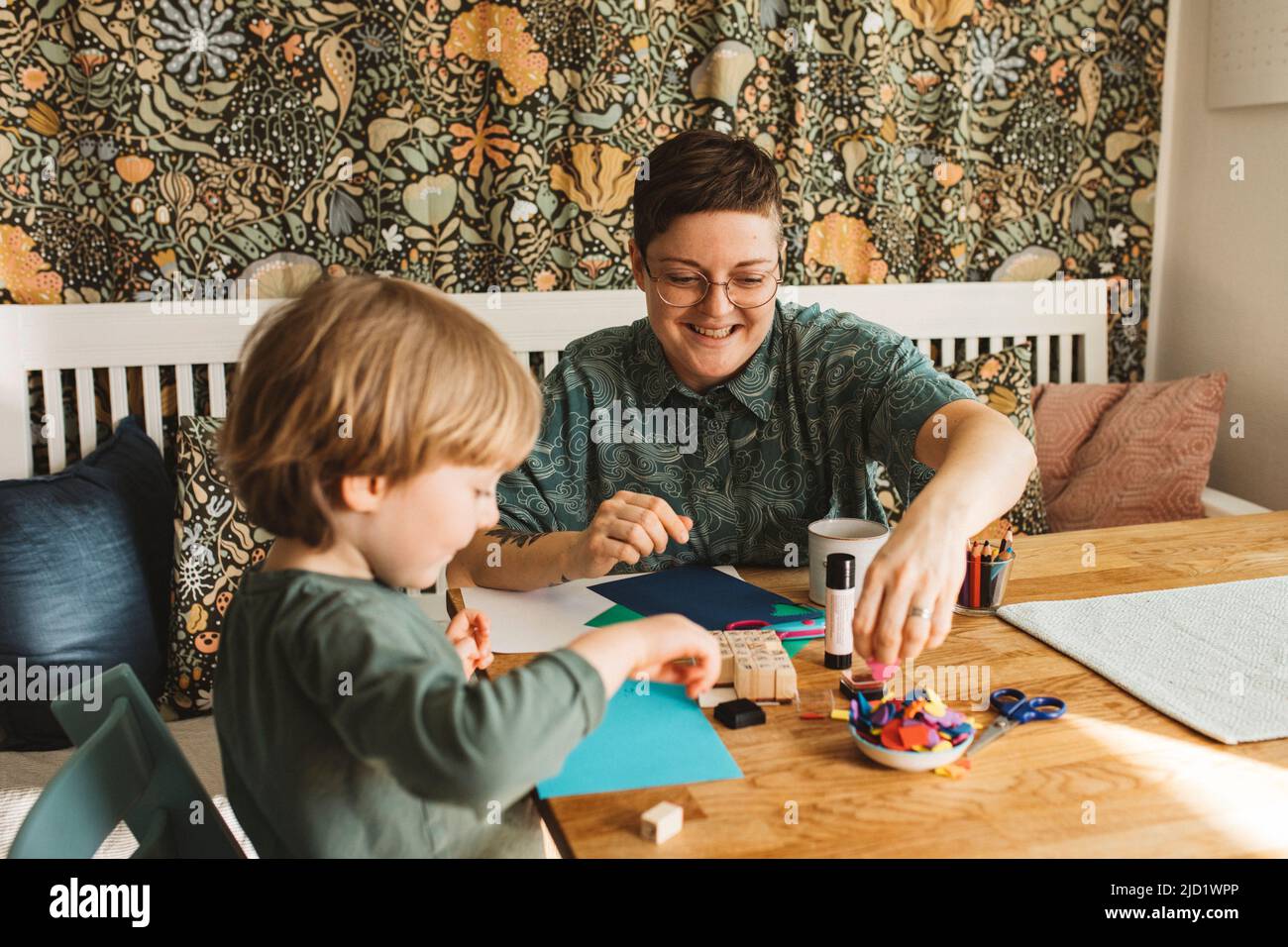 Mother and son doing craft together Stock Photo - Alamy