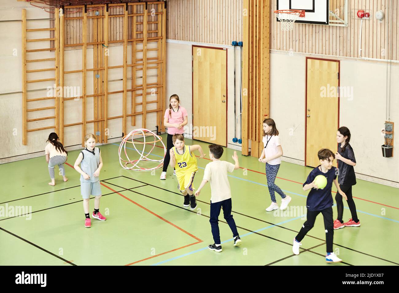 Children having PE class in school gym Stock Photo - Alamy