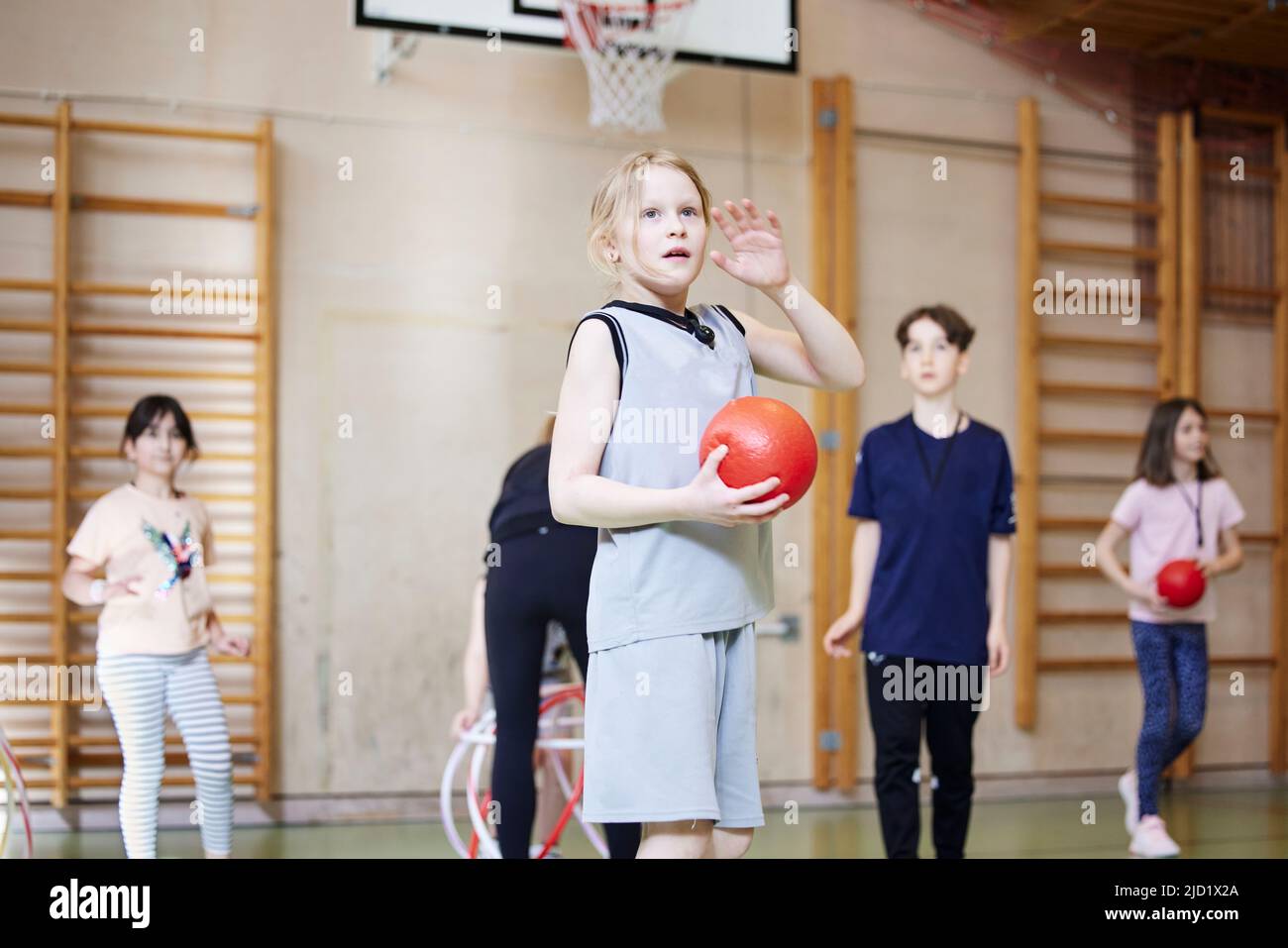 Children having PE class in school gym Stock Photo - Alamy