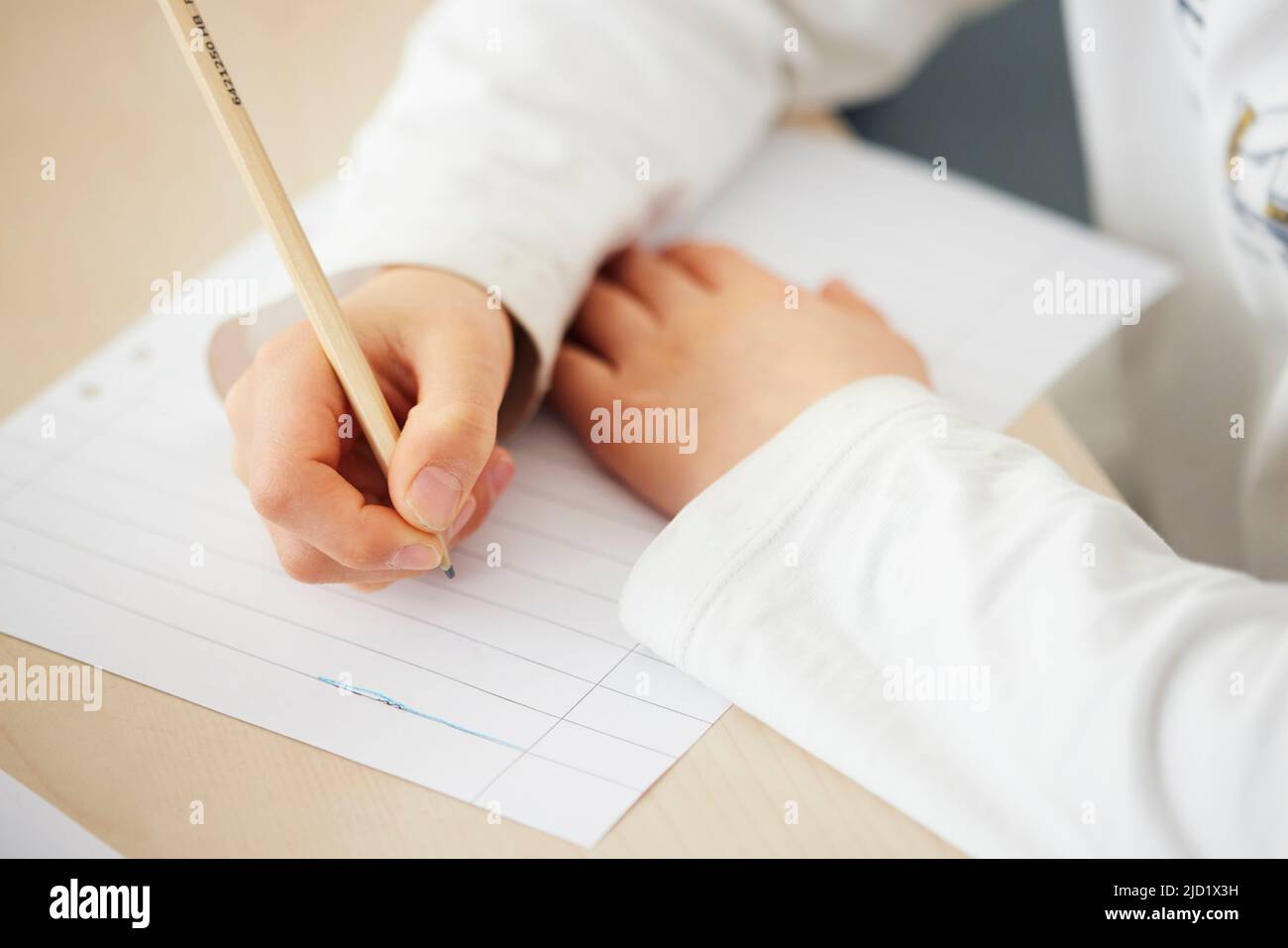 Child's hand writing Stock Photo - Alamy