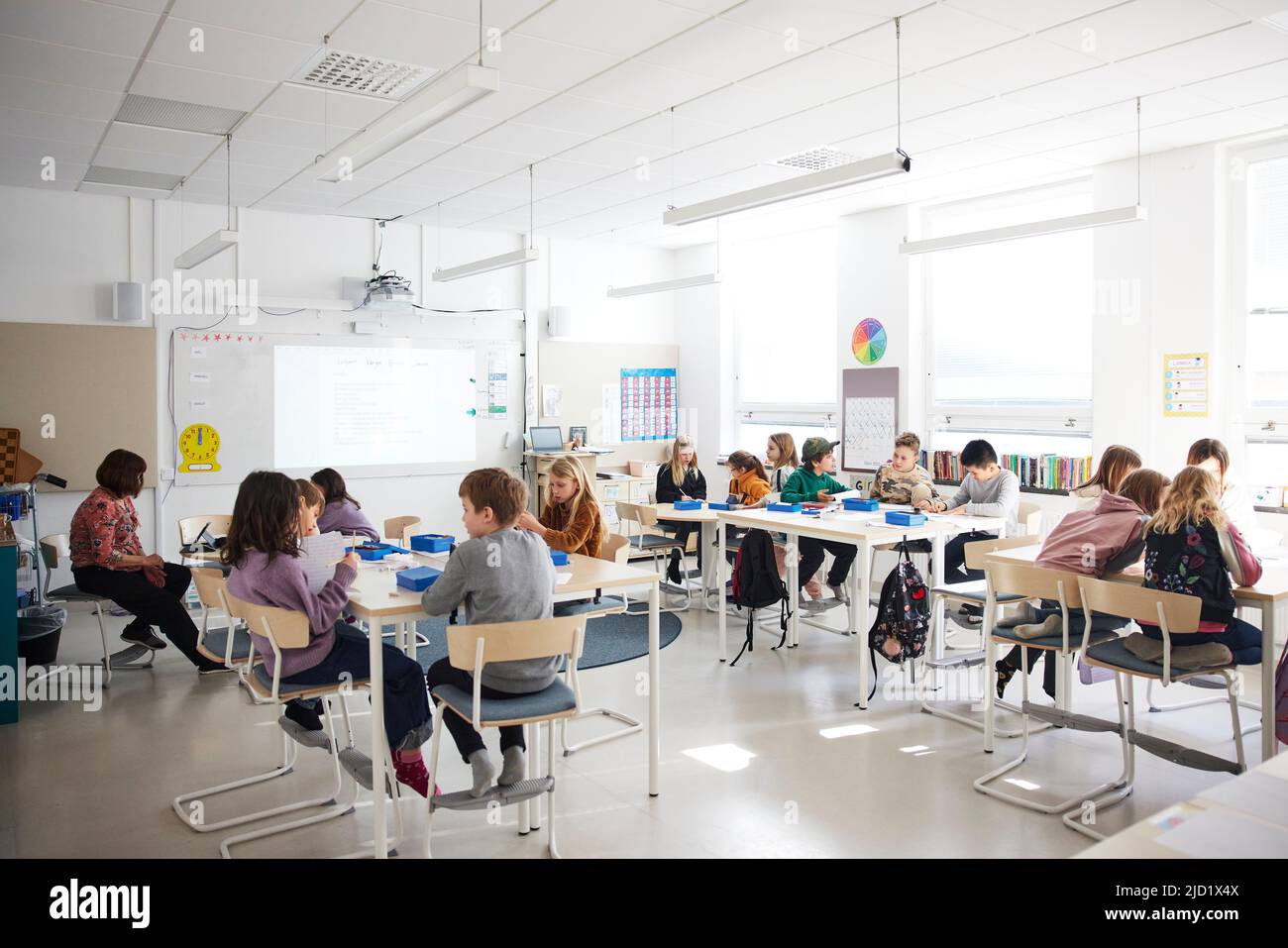 Students sitting in classroom Stock Photo - Alamy
