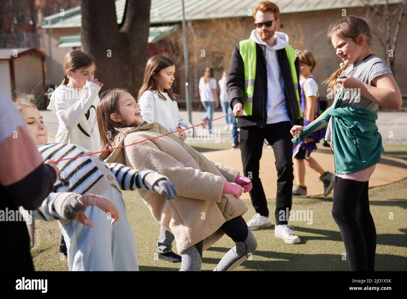 Children having fun at school yard Stock Photo - Alamy